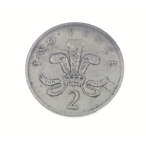 A silvered 1990 UNITED KINGDOM 2 Pence coin. With light wear and patina ...