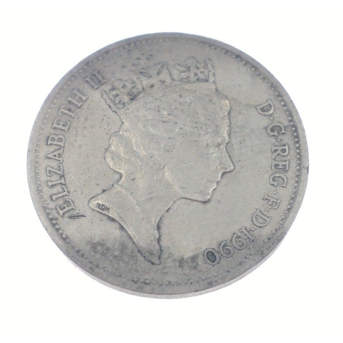 A silvered 1990 UNITED KINGDOM 2 Pence coin. With light wear and patina ...