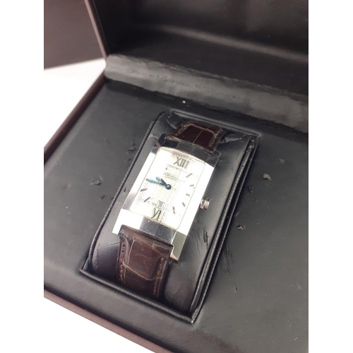 A traditional styled DUNHILL WR30M square facet Quartz watch on ...