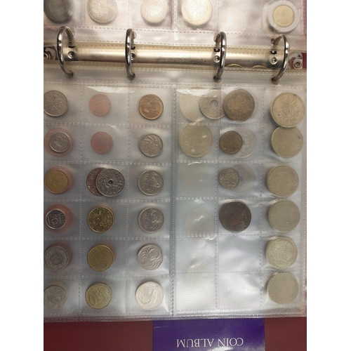A super WH SMITH coin album filled with foreign coins of various ...