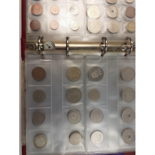 A super WH SMITH coin album filled with foreign coins of various ...