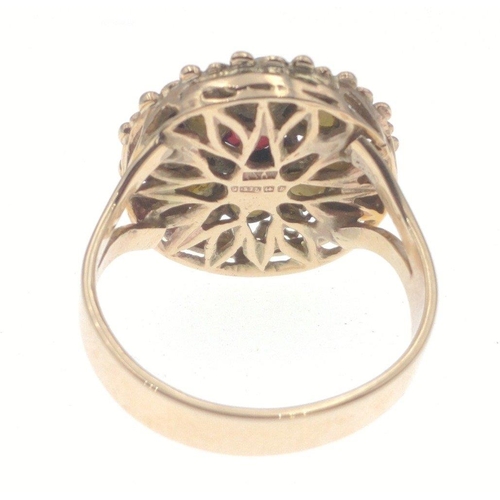 An impressive large fully hallmarked 375 gold ring with a 7mm red ruby ...