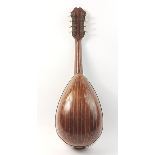 A MANDOLIN. A pretty 60cm Mandolin with use but body seems in good ...