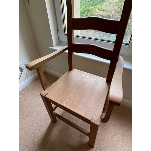 A modern solid wood carver chair - it has the look of Tim Stead#30