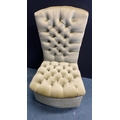 A medium sized DEEP-BUTTONED velour chair on castors - an ideal project ...