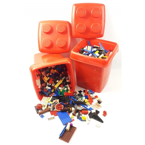 Two LEGO block shaped storage boxes filled with a great lot of useful ...