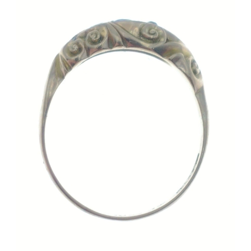 A 375 stamped yellow gold ring with blue stones and white stones inset ...