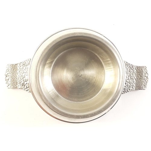 Pewter quaich with Celtic design on handles and around top of the ...