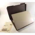 A TECNOSTYL complete drafting table in case. With wear.#616