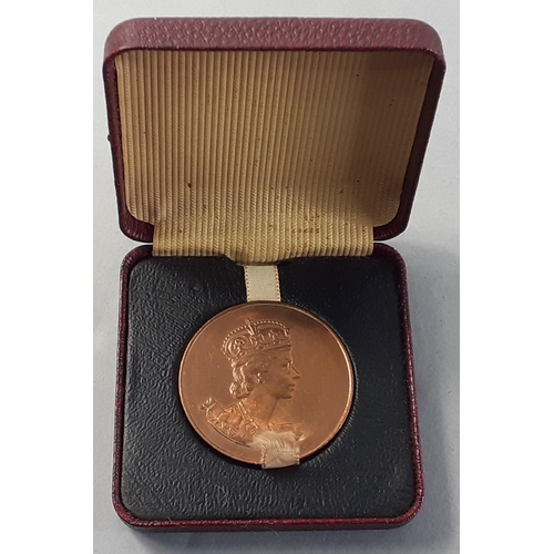 A large copper coin in case. 2 June 1953 Coronation medal.#132