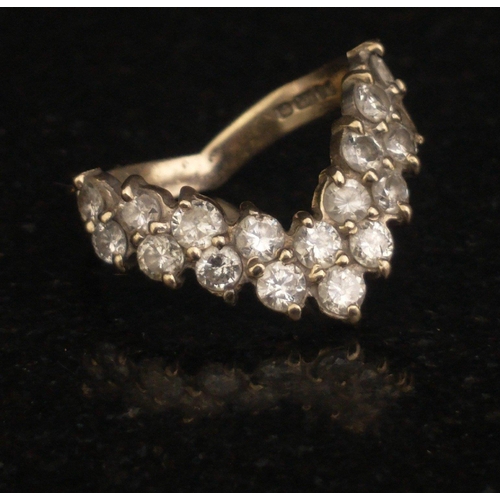 A SUBSTANTIAL vintage white 750 hallmarked 17 DIAMOND studded wishbone ...