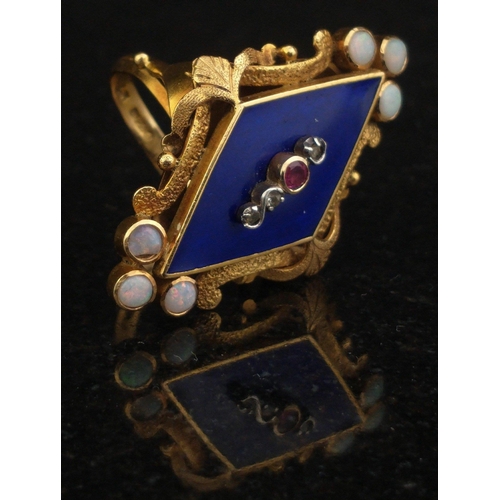 A stunning large 750 stamped ring with lozenge shaped blue enamel mount ...