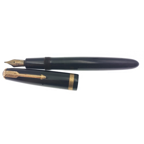 A PARKER DUOFOLD fountain pen with 14K nib. Black with gilt fittings ...