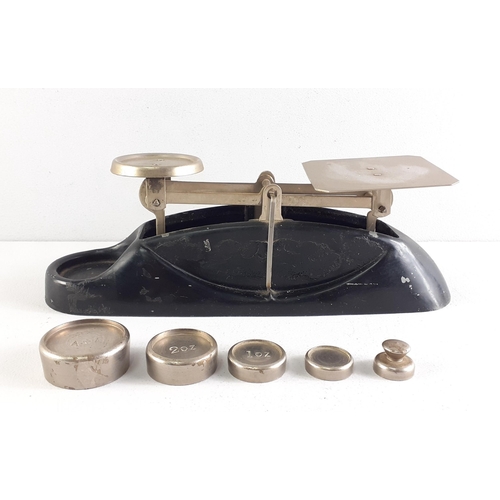 Small set of balance scales with weights.#559