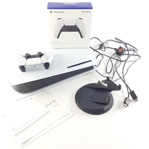PS5 boxed with a boxed controller and cables etc - in good condition ...