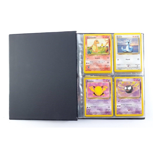 A small album of POKEMON cards. Includes 45 Japanese issues with some ...