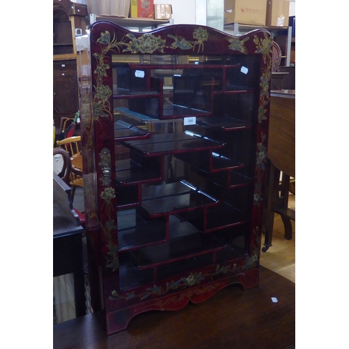 A SMALL ORIENTAL LACQUERED WALL HANGING DISPLAY CABINET WITH BIRD AND ...