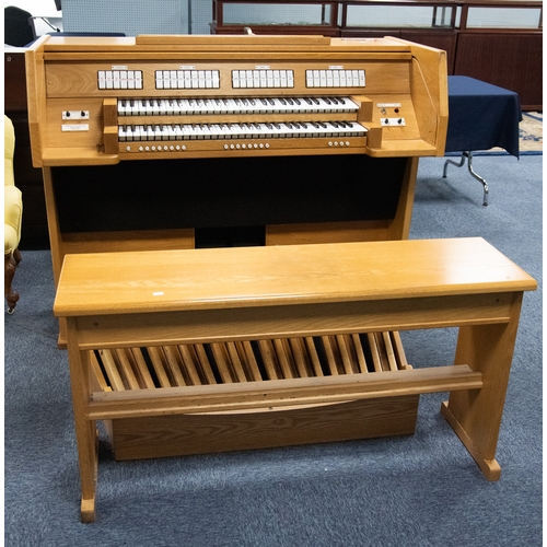 A LARGE ELECTRIC CHURCH ORGAN, IN LIGHT OAK CASE BY MAKIN ORGAN CO., OLDHAM