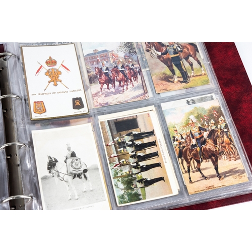 TWO LARGE RING BINDER POSTCARD ALBUMS, HOUSING A GOOD COLLECTION OF ...
