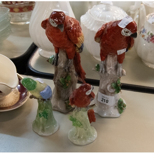 TWO SITZENDORF CERAMIC PARROTS. TOGETHER WITH TWO SMALLER EXAMPLES ONE ...