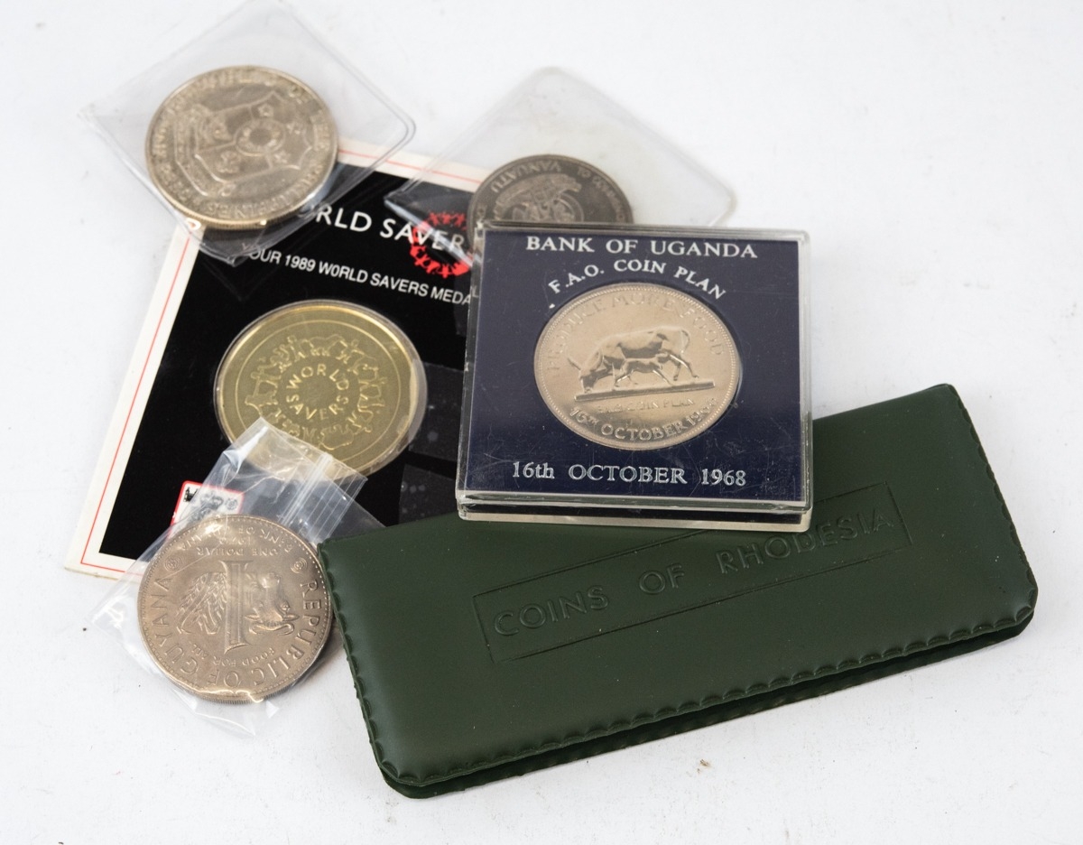 SET OF SEVEN UNCIRCULATED COINS OF RHODESIA, in a plastic coin wallet ...