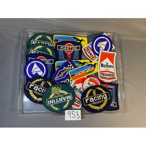Tray of 1980's motor racing cloth patches