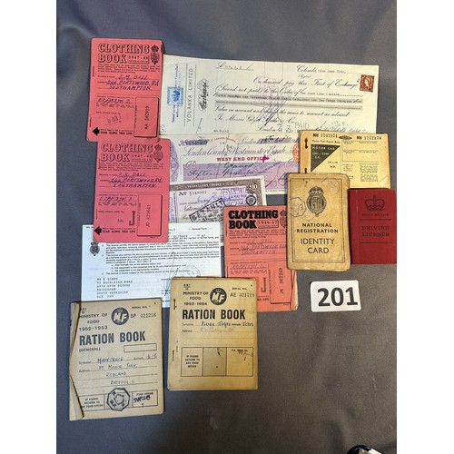 Vintage paperwork to include ration books, clothing books, etc.