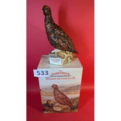 Boxed bottle of Famous Grouse whisky