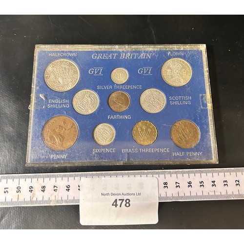 George VI British coin set in a display case