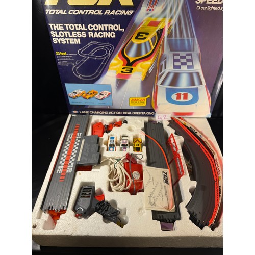 A vintage TCR Total Control Racing slotless racing system, “Lighted Jam ...