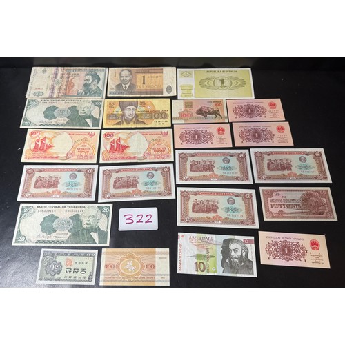 A mixed group of foreign banknotes from various countries and denominations