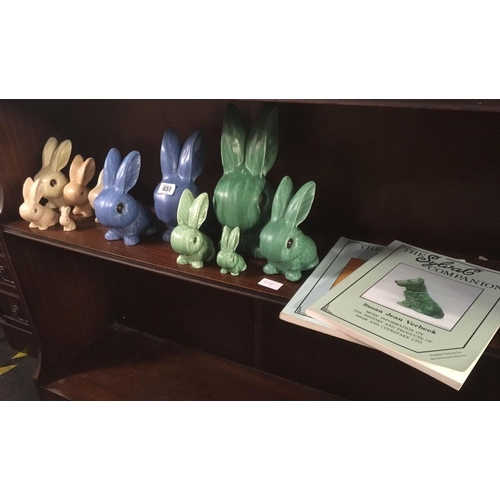 11 VARIOUS SIZED SYLVAC RABBITS IN BEIGE, BLUE & GREEN WITH SYLVAC CATALOGUES