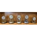 5 TORSION CLOCKS WITH GLASS OR PLASTIC DOMES