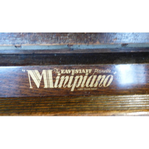An Eavestaff Pianette Minipiano as used by H R H Princess Ingrid of Sweden