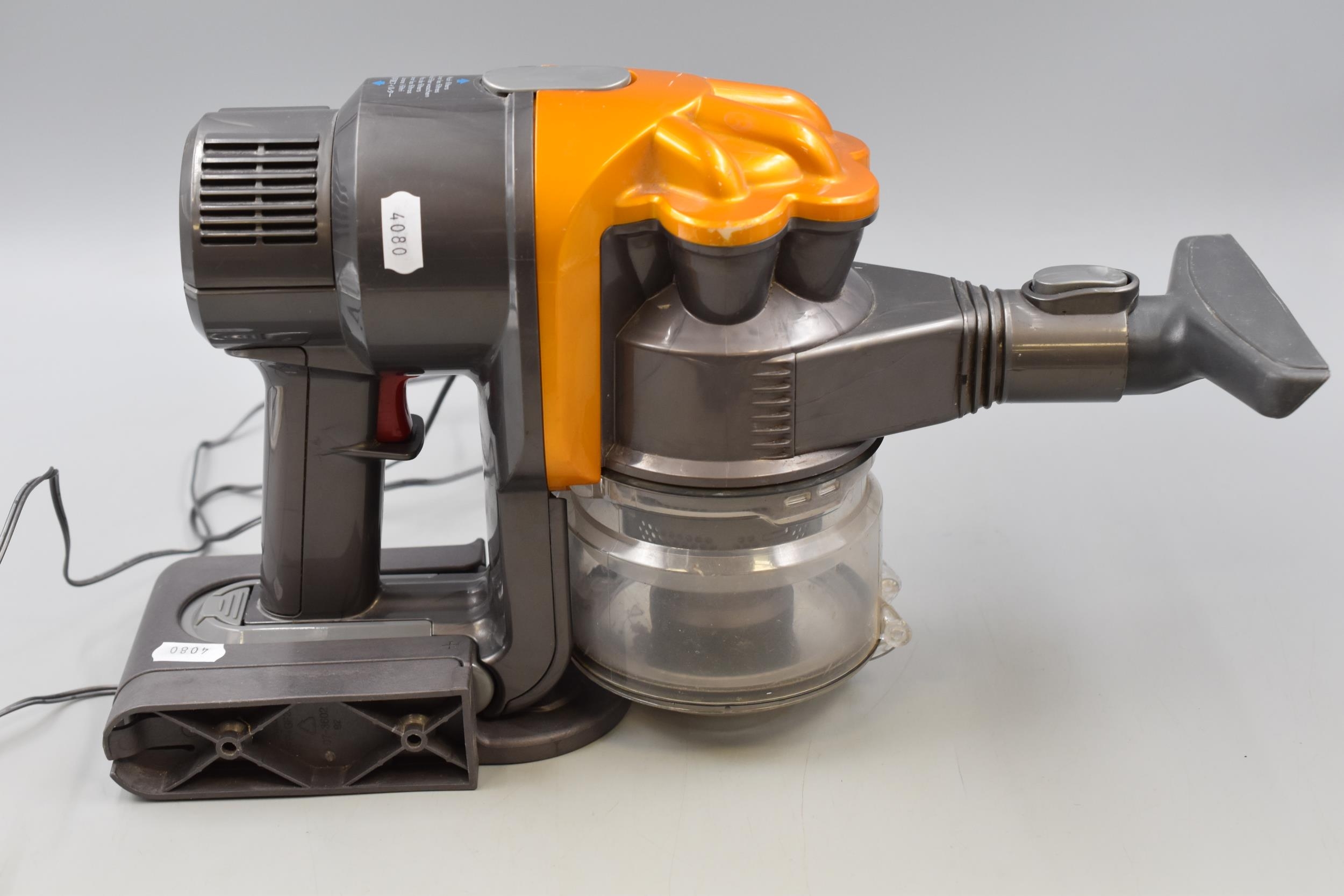Dyson DC16 Cordless Hoover Complete with Charger and what seems to be a ...