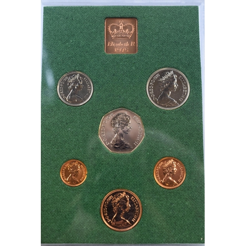 Selection of Four Cased Royal Mint Proof Coin Sets. Includes 1972, 1975 ...