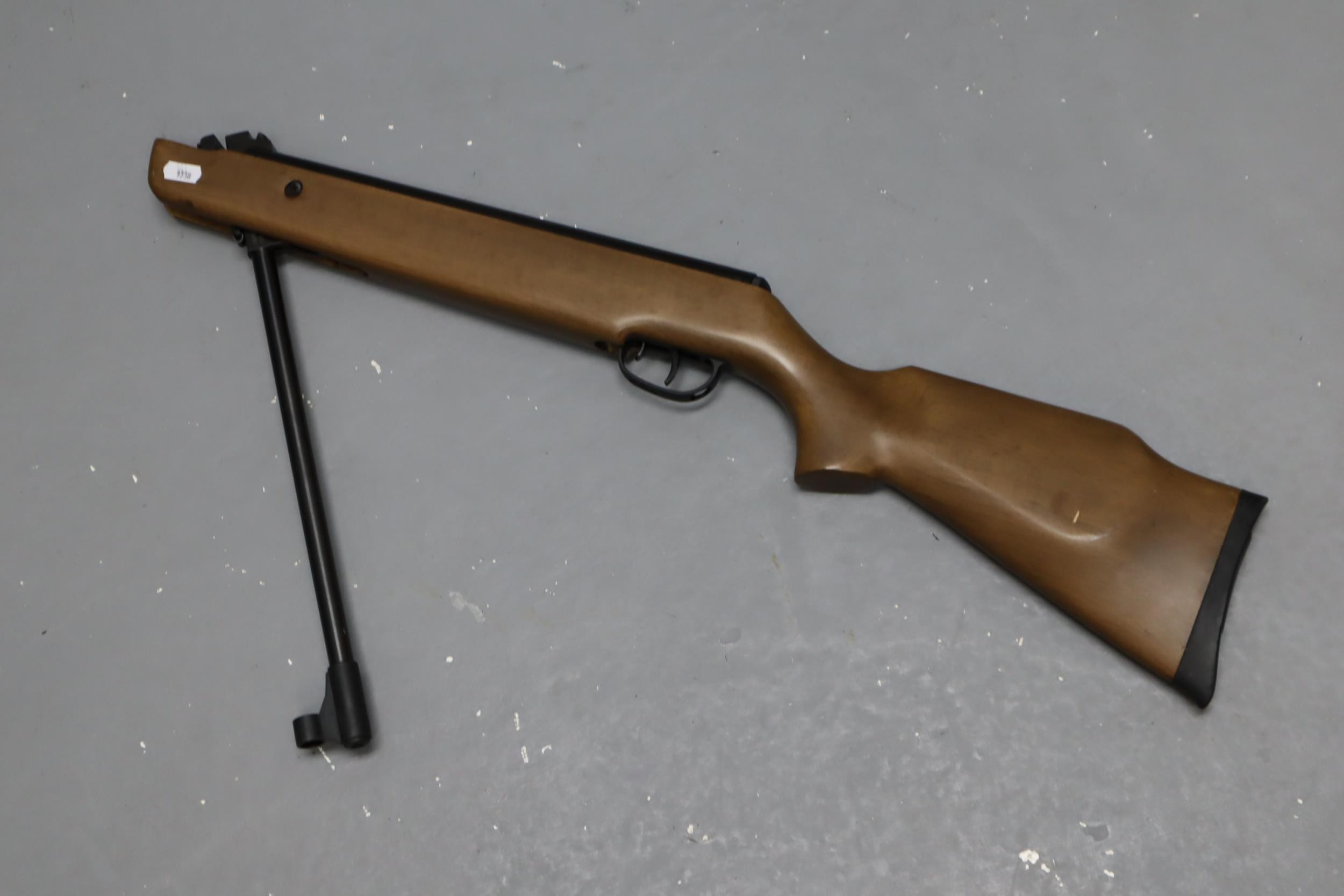 An SMK 19-18 .22 break action air rifle with three quarter length ...