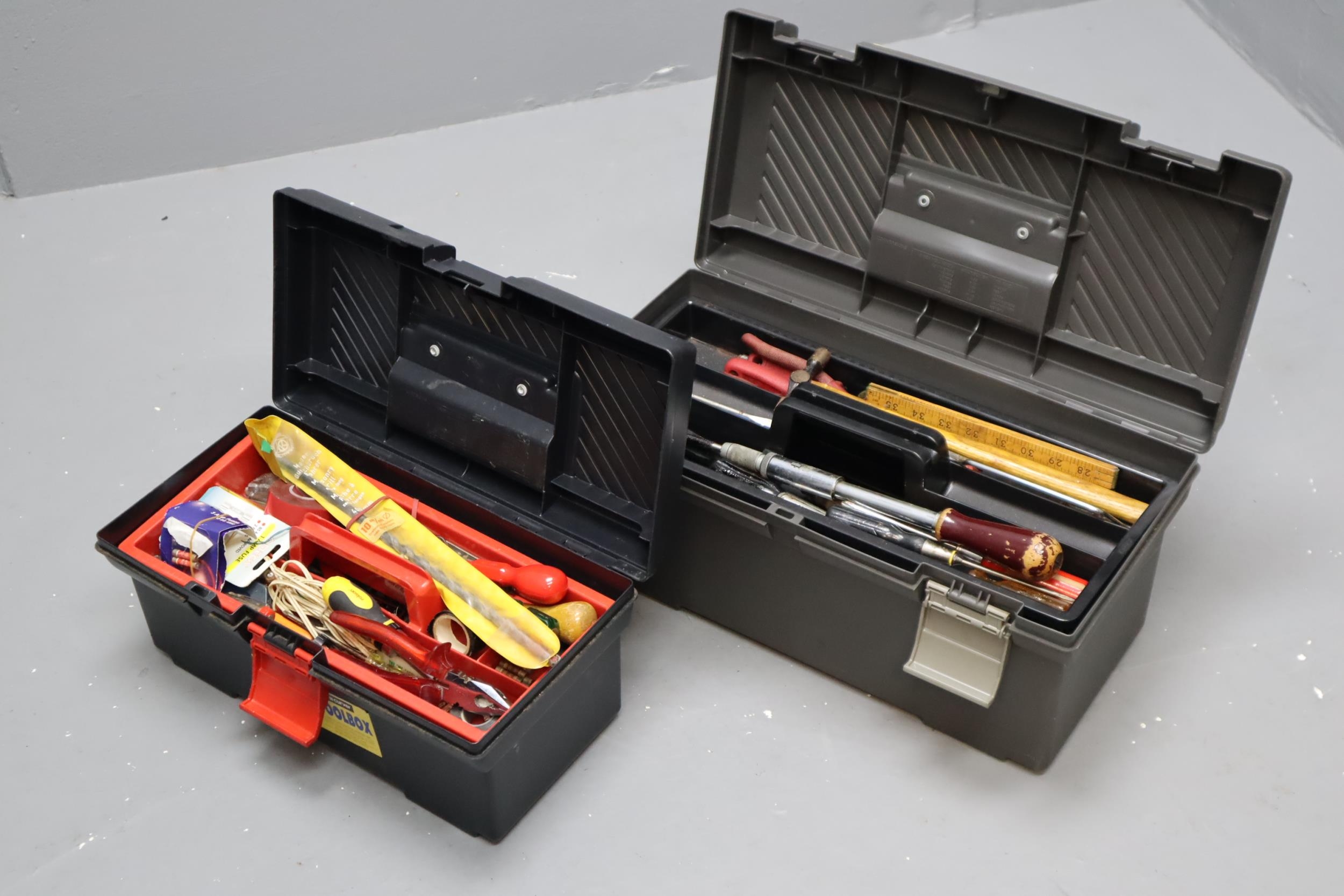 Two plastic Curver toolboxes with a selection of tools large 20" wide x ...