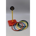 A Vintage Golly Face Ring Toss Game, With Five Rings