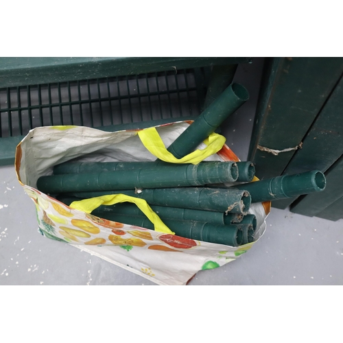 Nine sections of green plastic racking with connecting tubes/legs ...