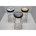 Three bar stools featuring band logos of Guns & Roses, The Doors and ...