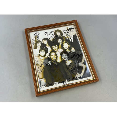 A Framed and Glazed Signed Fame TV Show Cast Photo, Approx 27.5cm x 22.5cm