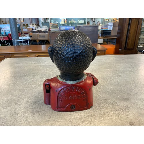 Jolly man vintage cast iron money box measures 17cm high