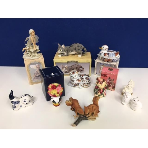 A collection of boxed & unboxed ceramic figures. includes Regency Fine ...