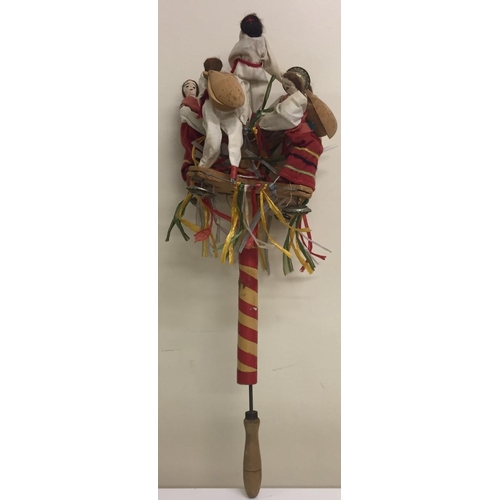 A vintage Folk Art festival rattle stick/Maypole. Length 58cm.