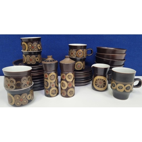A quantity of dark brown retro 'Denby' 'Arabesque' dinnerware. Thirty ...