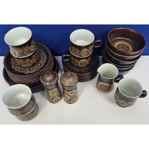 A quantity of dark brown retro 'Denby' 'Arabesque' dinnerware. Thirty ...