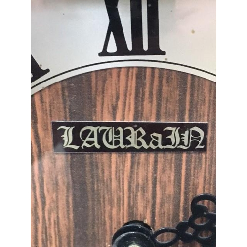A vintage 'Laurain' 31-day pendulum wall clock. Complete with keys ...