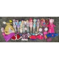 A large collection of nine dolls & accessories.