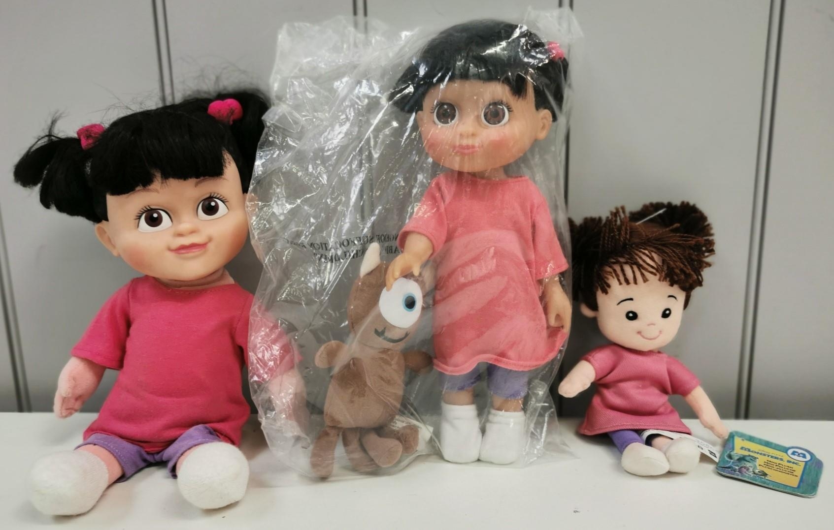 A selection of thirteen Boo dolls from Monsters Inc. All official ...